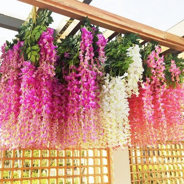 7 Beautiful Wedding Arch Garland Ideas We Just Can't Stop Staring At