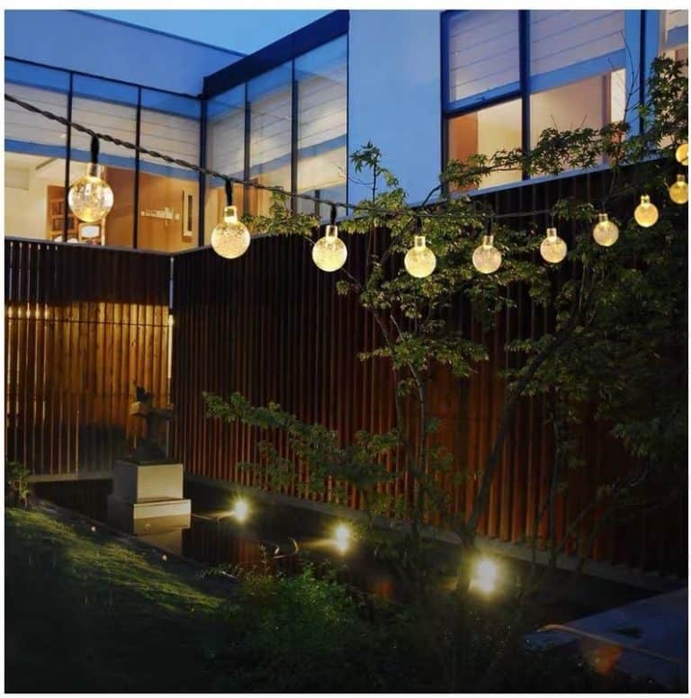 These Ideas for Wedding Arches with Lights Really Dial Up the Wow Factor